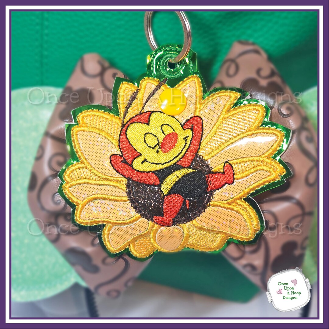 Spike the Bee on Flower Mears Headband Holder ITH Digital Machine ...