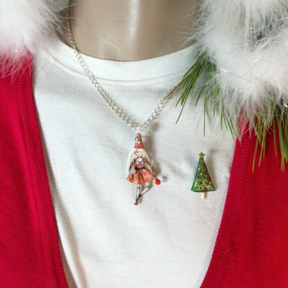 Tiny Elf with a Squirrel Have a pin on the back and is articuladed ...