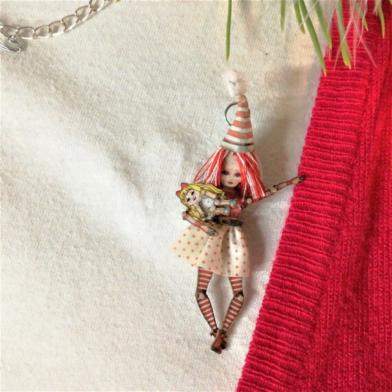 Tiny Elf with a Squirrel Have a pin on the back and is articuladed ...