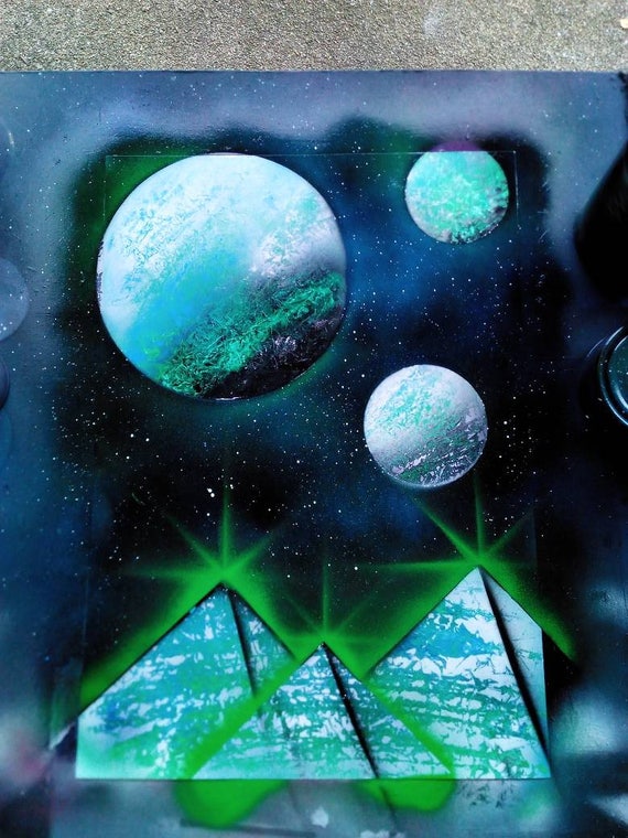 Spray Painting Of Pyramid In Space