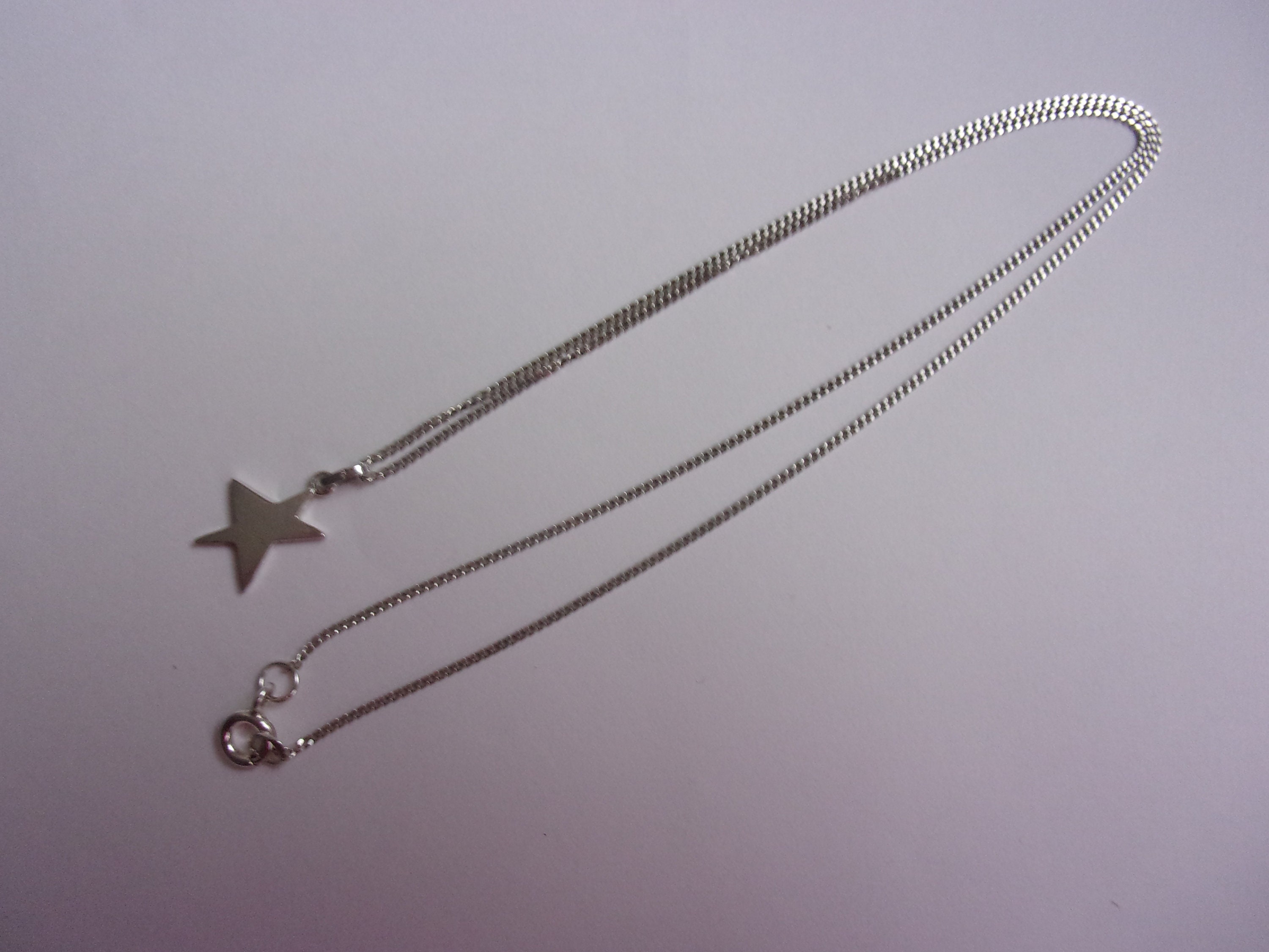 Star pendant on silver chain | Etsy