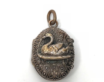 Swan locket | Etsy