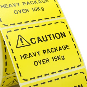 Caution Heavy Package Over 15kg. Bright Yellow Shipping Labels ...