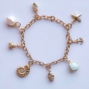 18 karat gold charm bracelet store