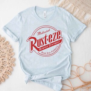 Rust-eze Logo T-shirt Cars Rusteze Bumper Ointment Radiator Springs ...