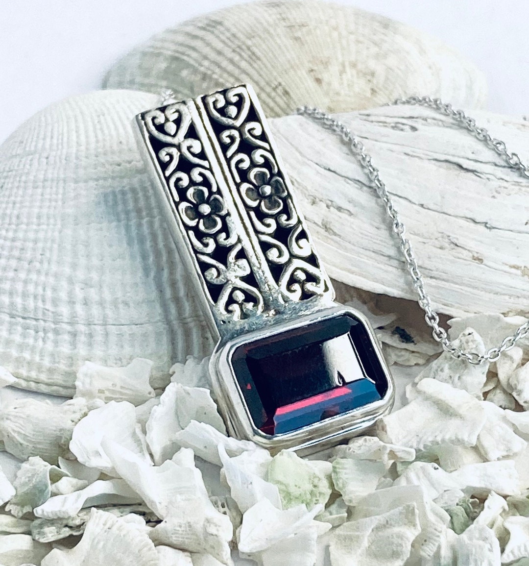 Elongated Pendant Hand Carved With Floral Pattern and Set With Natural ...
