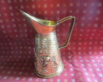 Embossed Pitcher - Etsy