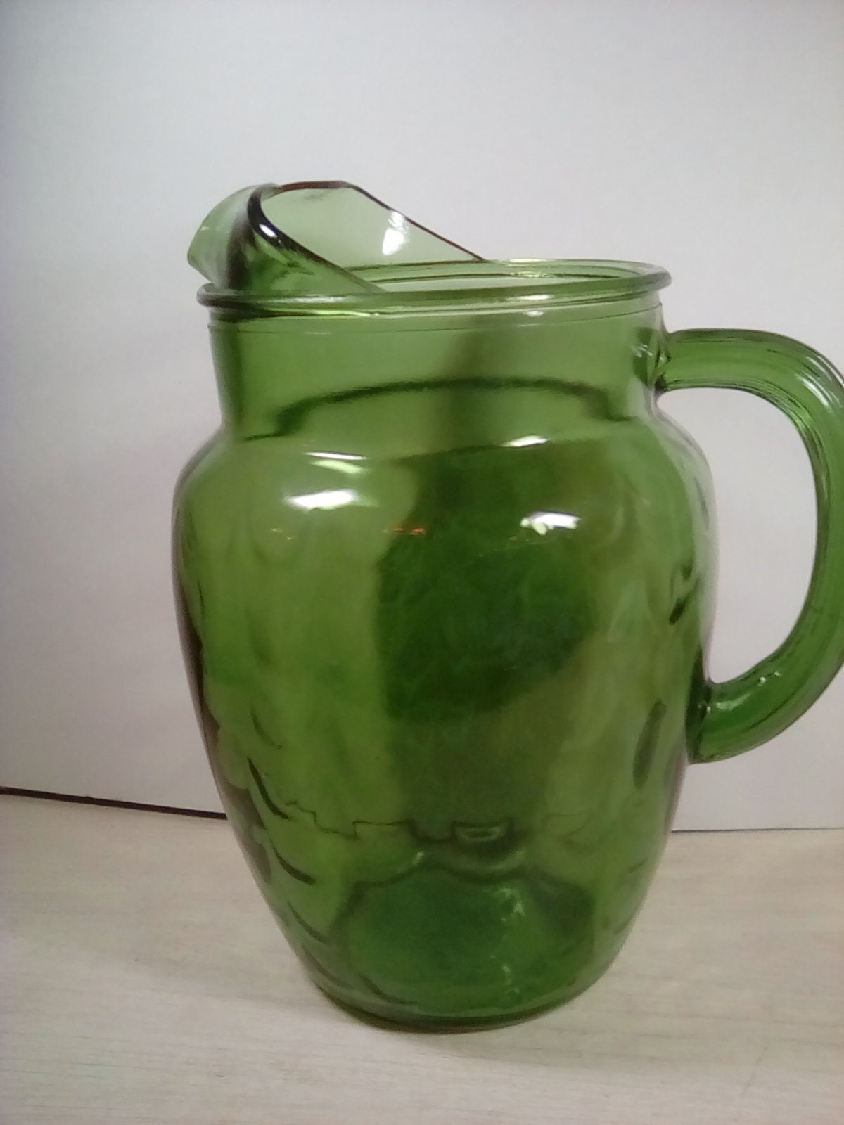 Green glass tall drinking pitcher | Etsy