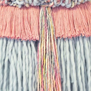Yarn Weaving With Pastel Colors and a Purple Triangle Funfetti Yarn and ...