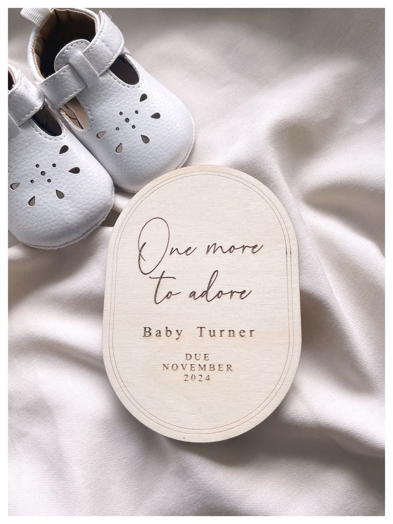 One More to Adore / Oval Pregnancy Announcement Disc / Baby Name ...