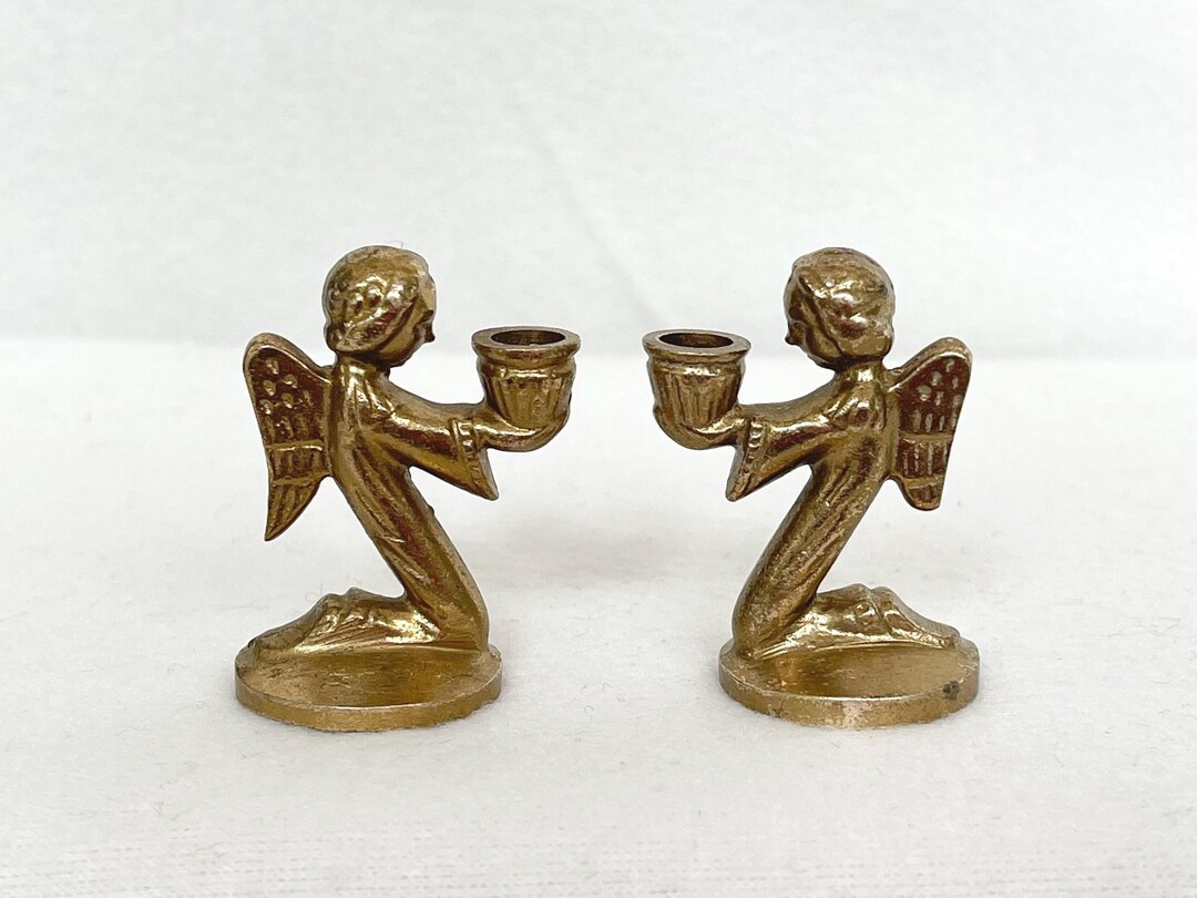 A Vintage Pair of Mini Solid Brass Angel/cherub Tapered Candlesticks ...