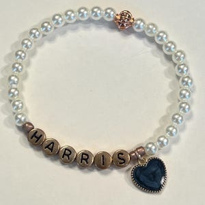 50% Donated to HARRIS 2024, Faux Pearl, Rose Gold Acrylic Letters and ...