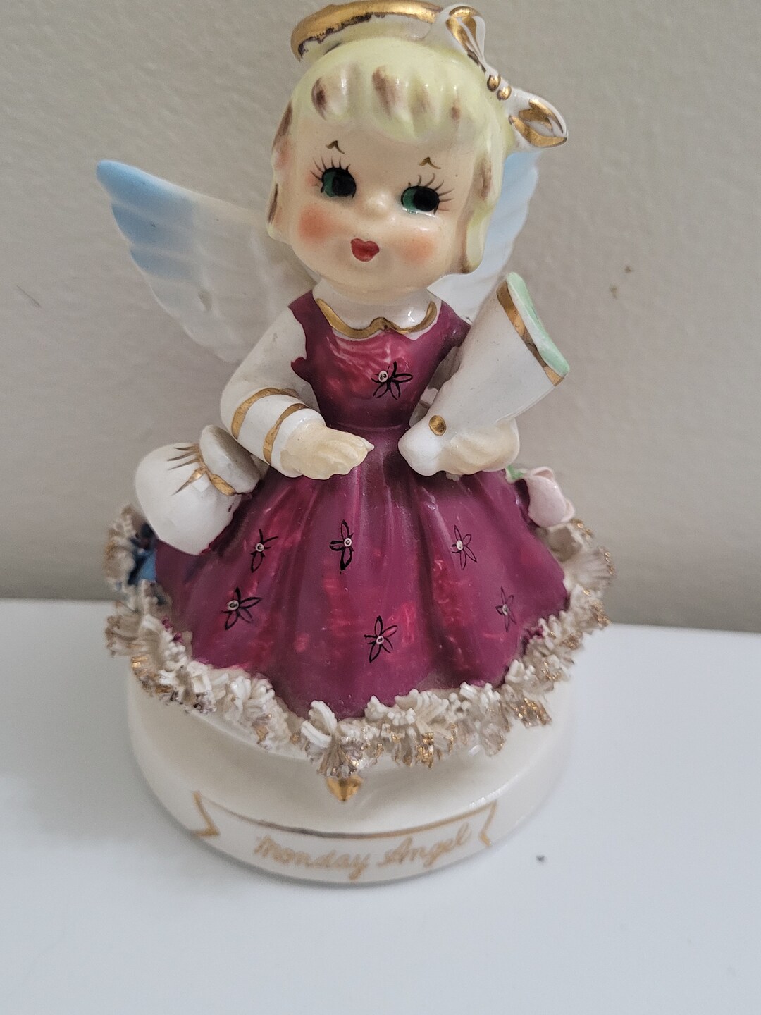 TMJ monday Angel Holding Bouquet and Purse - Etsy