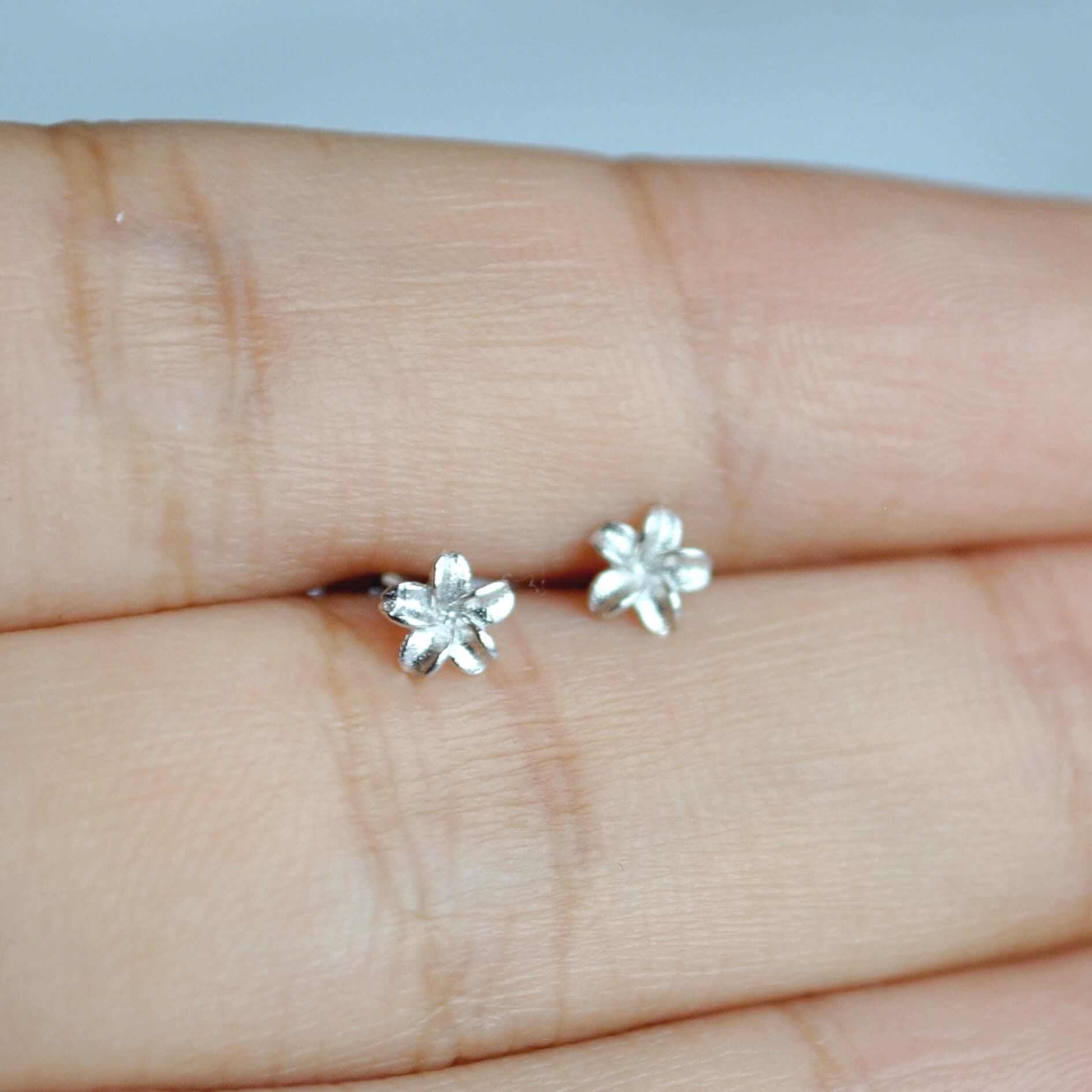 Tiny silver flower stud earrings. Small sterling silver | Etsy