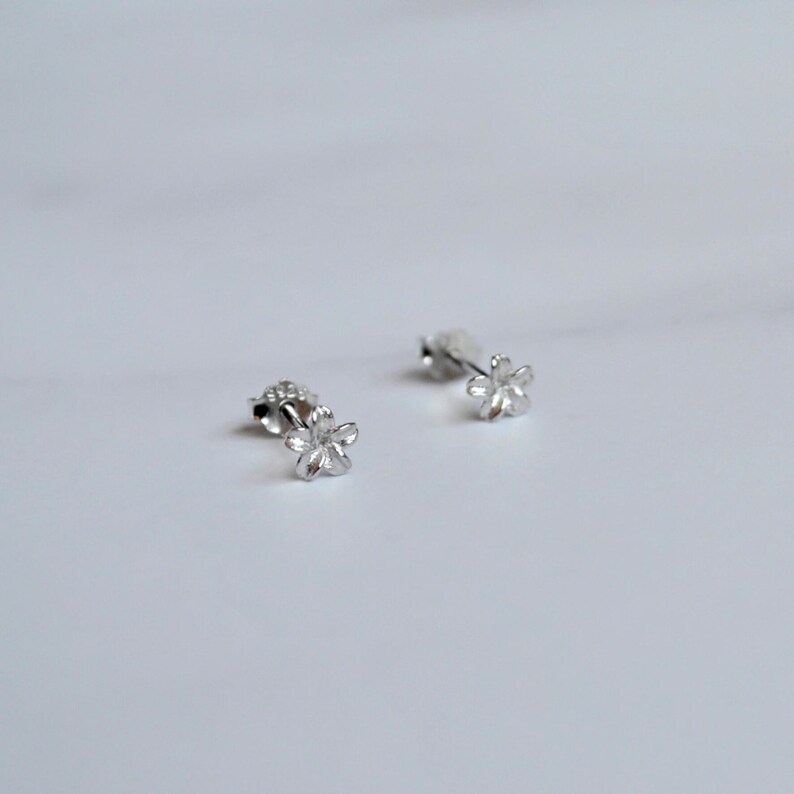 Tiny silver flower stud earrings. Small sterling silver | Etsy