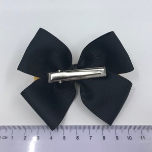 Black Double Layer Bow With Yellow Gold Single Top Layer and Top Knot ...