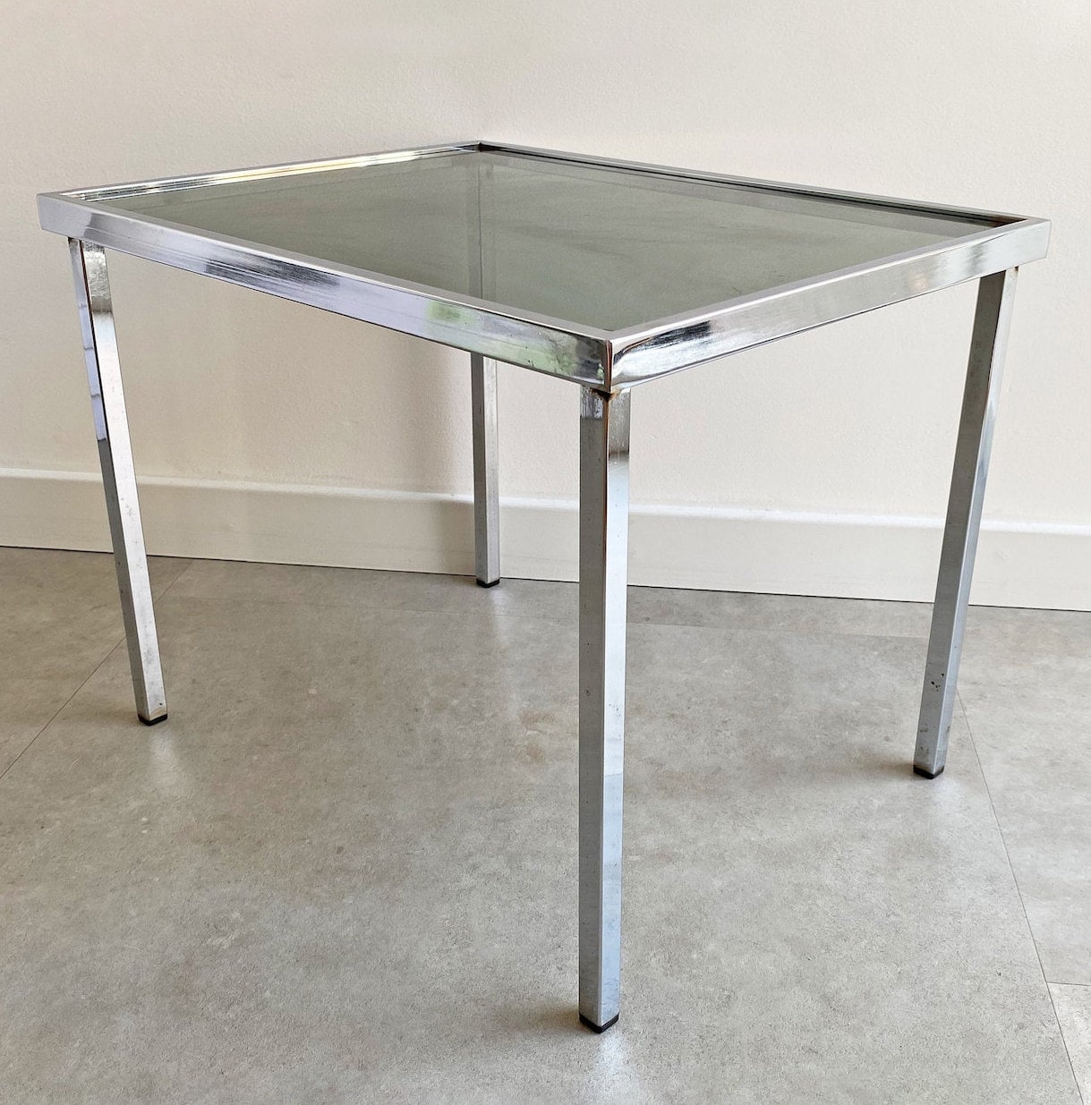 Glass and chrome bedside table store
