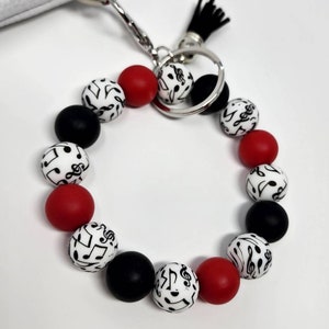 Music Notes Trio Wristlet Keychain Stretchy Bracelet & Tassel Silicone ...