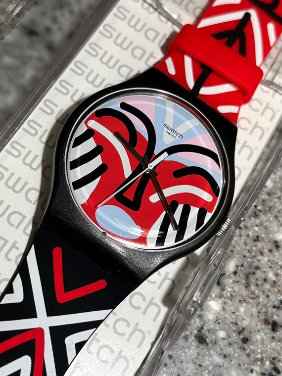 Swatch Watch Mask Parade is an attractive 41mm larger… - Gem