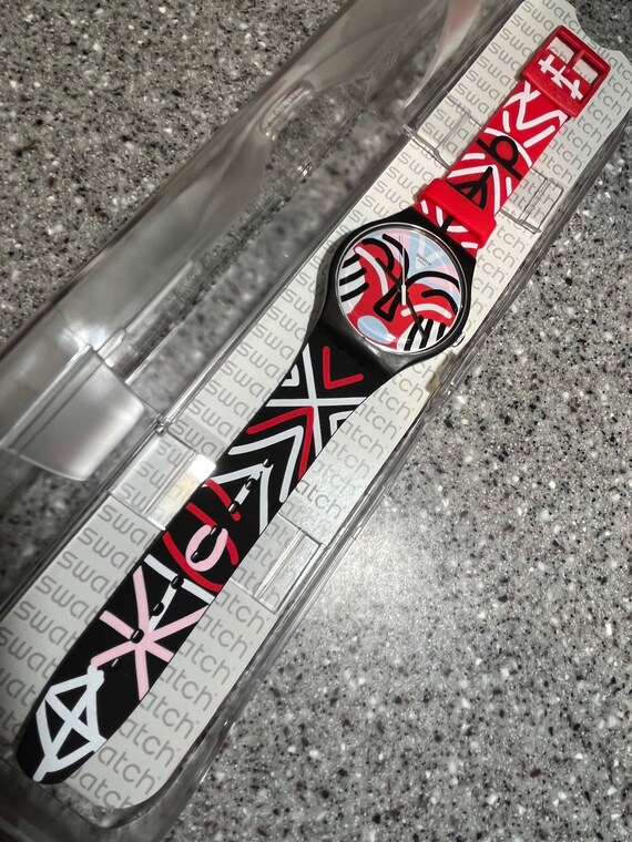 Swatch Watch Mask Parade is an attractive 41mm larger… - Gem