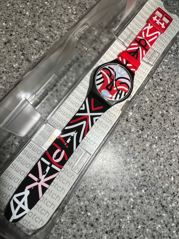 Swatch Watch Mask Parade is an attractive 41mm larger… - Gem