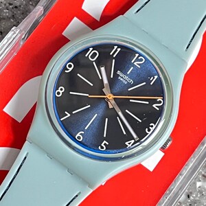 NEW Never Worn Swatch Watch 34mm Has a Great Dark Blue Dial Featuring ...