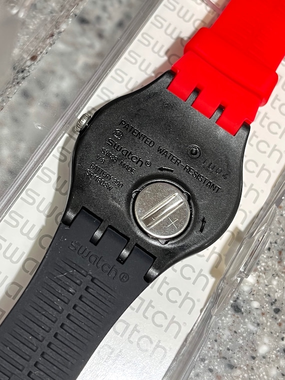 Swatch Watch Mask Parade is an attractive 41mm larger… - Gem