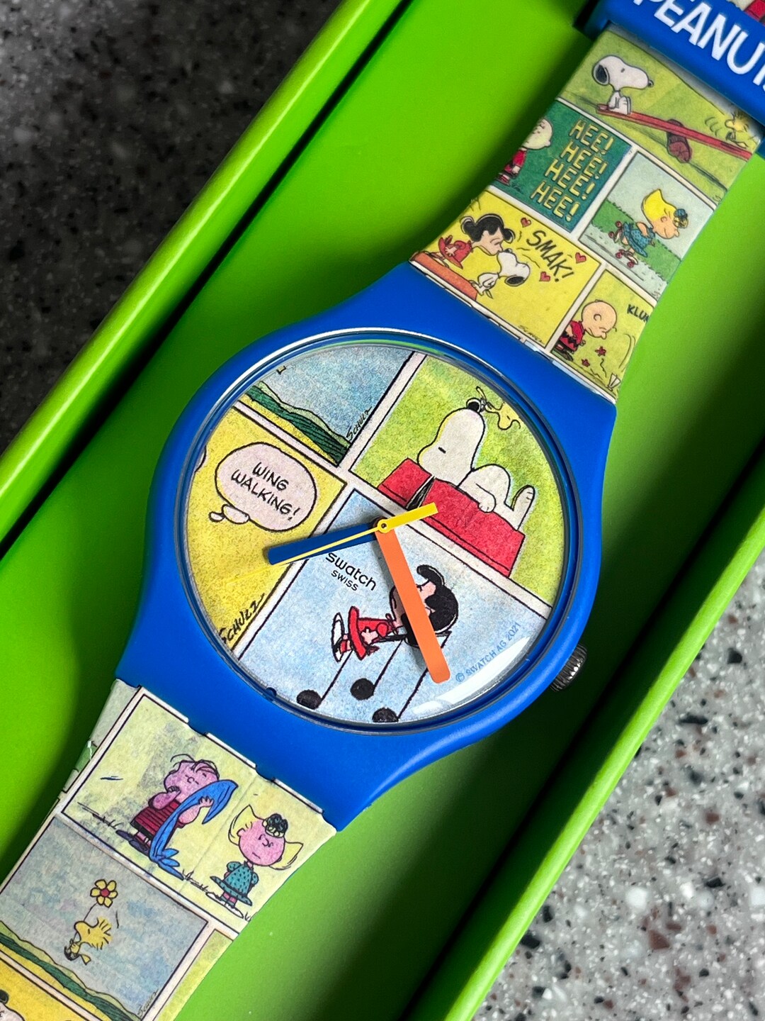 Peanuts Swatch Watch Called SMAK It Has a 41mm Face and Comic Strip ...