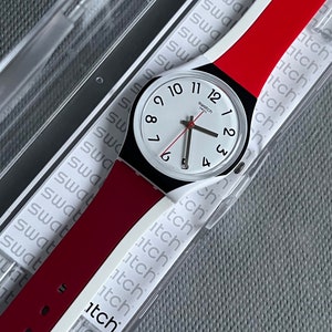Swatch Watch Called Redtwist Two Shades of Fiery Red Splashed on White ...