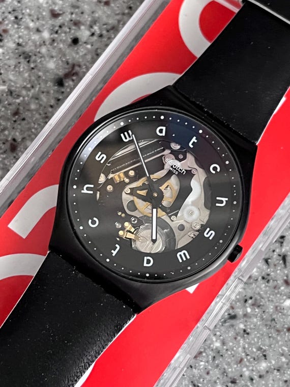 Swatch watch black and white logo SKIN swatch 42mm la… - Gem