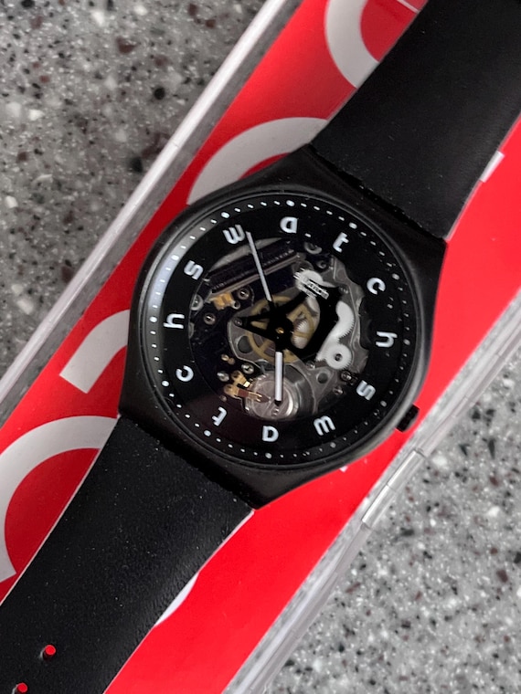 Swatch watch black and white logo SKIN swatch 42mm la… - Gem