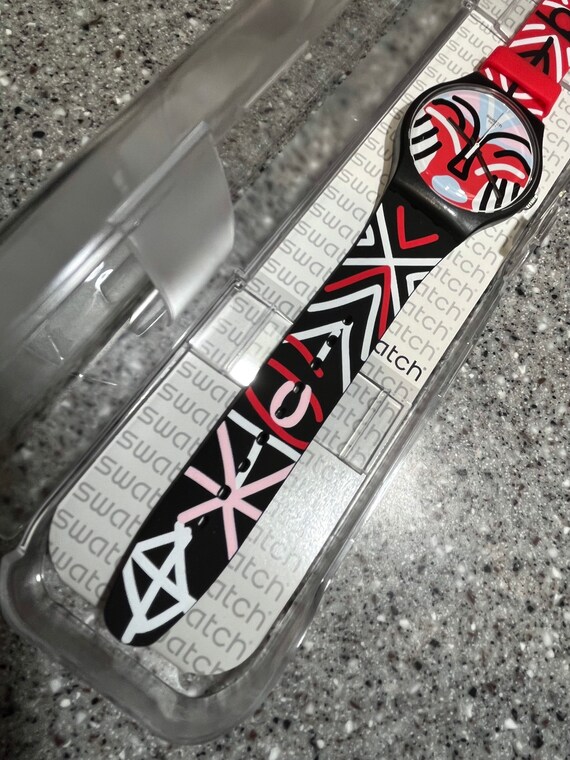 Swatch Watch Mask Parade is an attractive 41mm larger… - Gem