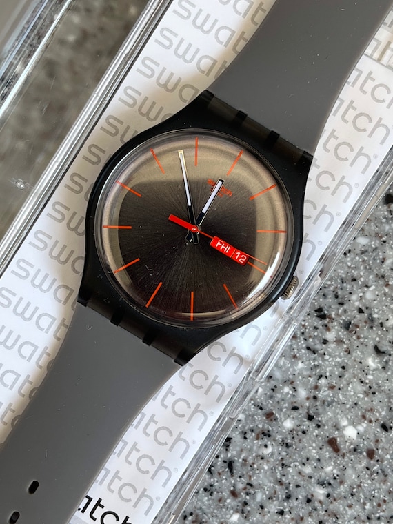 Swatch Watch Warm Rebel grey and orange day date feat… - Gem