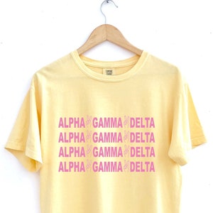 Alpha Gamma Delta // Alpha Gam // Pink and Yellow Peace Sorority Shirt ...