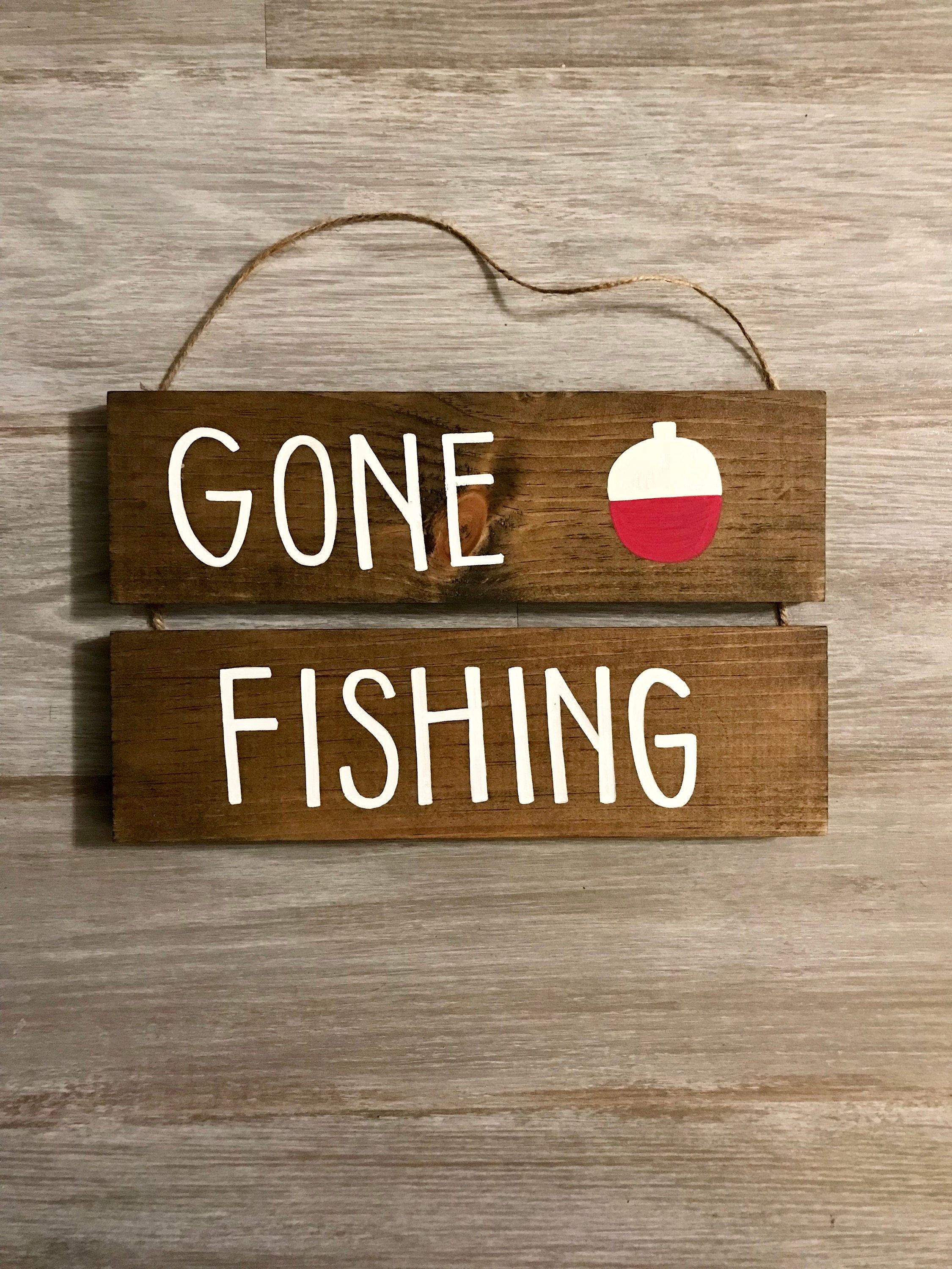Gone Fishing Sign On Door