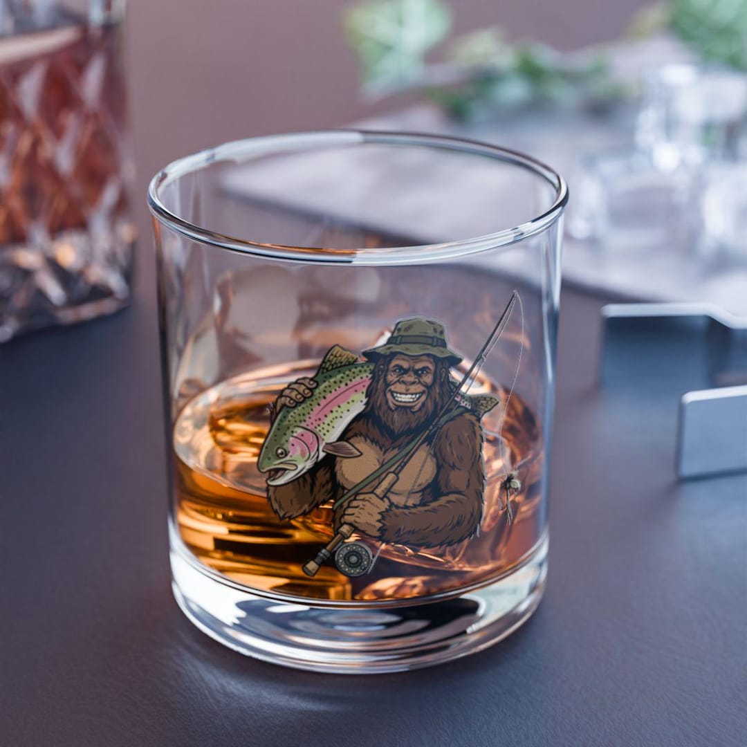 Bigfoot Carrying Trophy Steelhead Fishing Whiskey Glass, Sasquatch ...