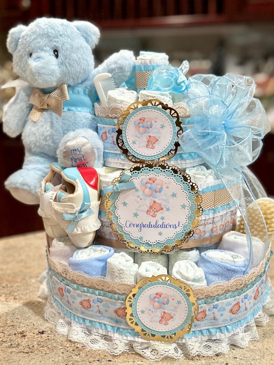 Teddy Bear Diaper Cake With Plush Light Blue Bear, Crib Shoes, Brush/comb, Pacifiers, Washcloths ...