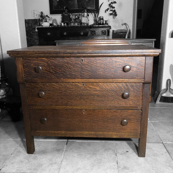 Low oak chest of drawers store