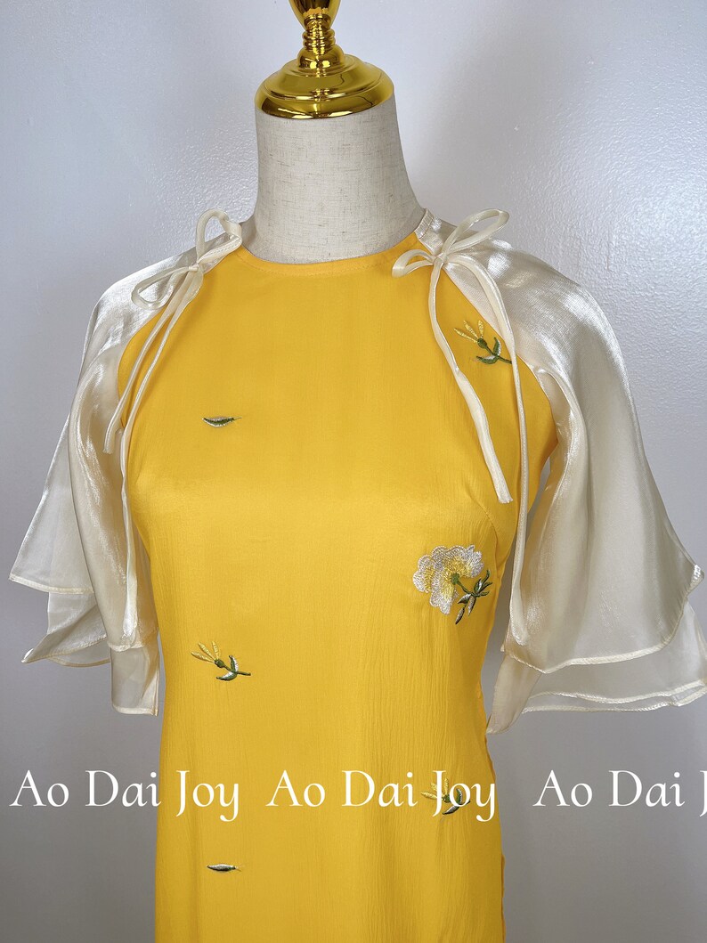 Yellow Modernized Ao Dai Lua to Embroidery Beautiful Flowers Pants ...