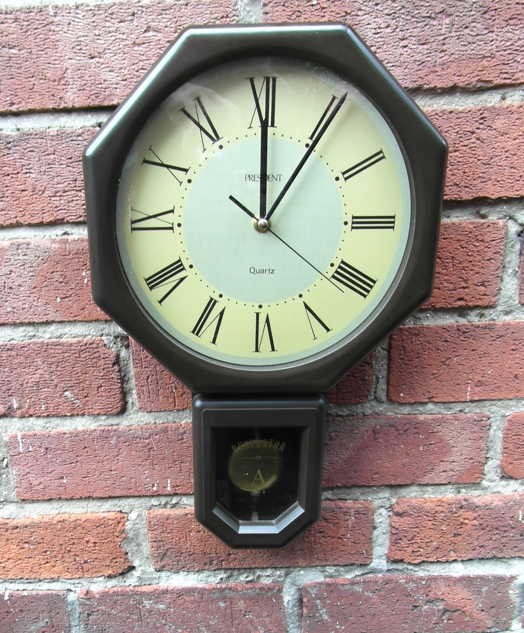 A 1980s President 'drop Dial' Quartz Wall Clock - Moving Pendulum ...