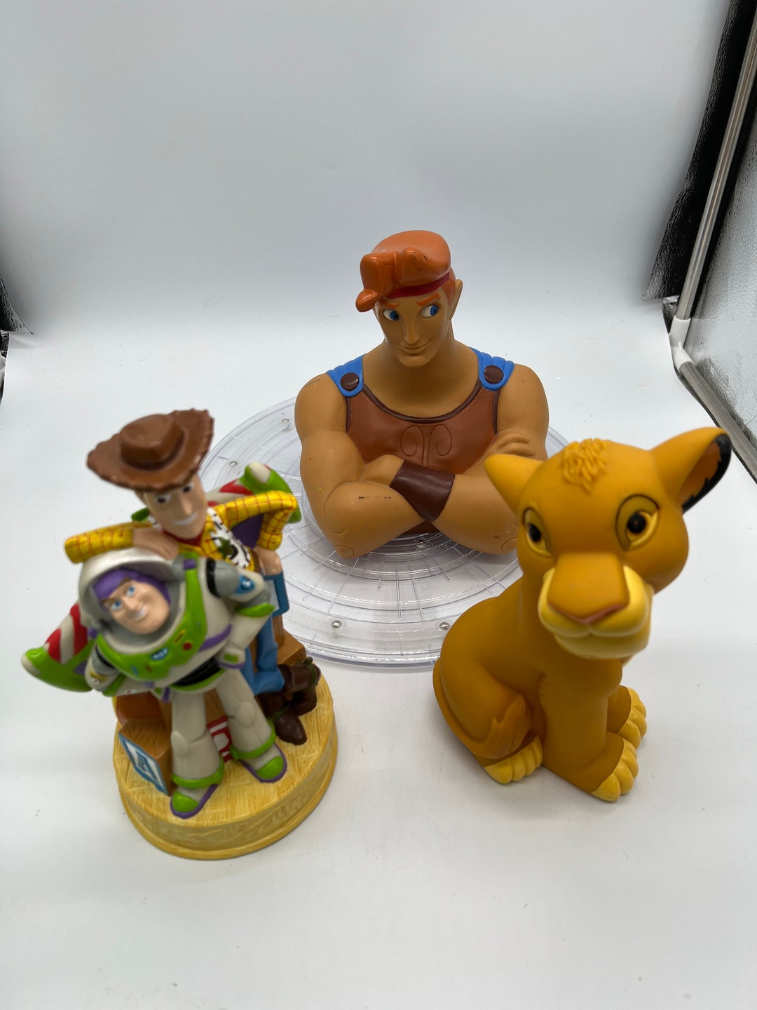 Vintage Disney Simba, Buzz and Woody and Hercules Piggy Banks. Sold ...