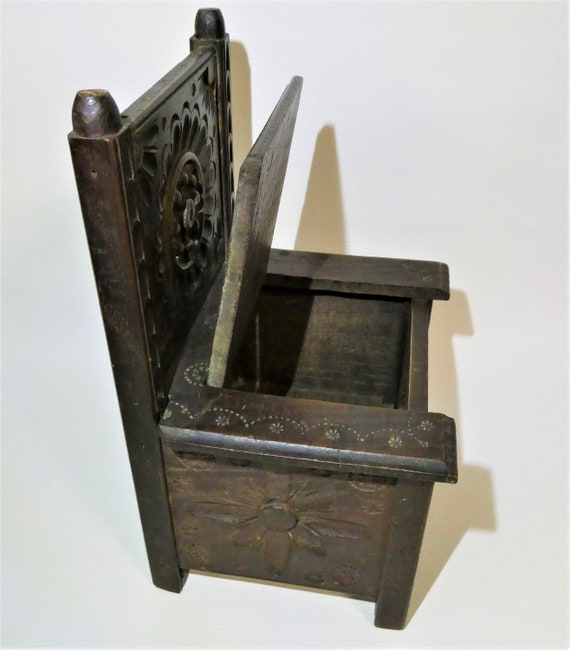 Old and beautiful chair (secret jewelry box) in carve… - Gem
