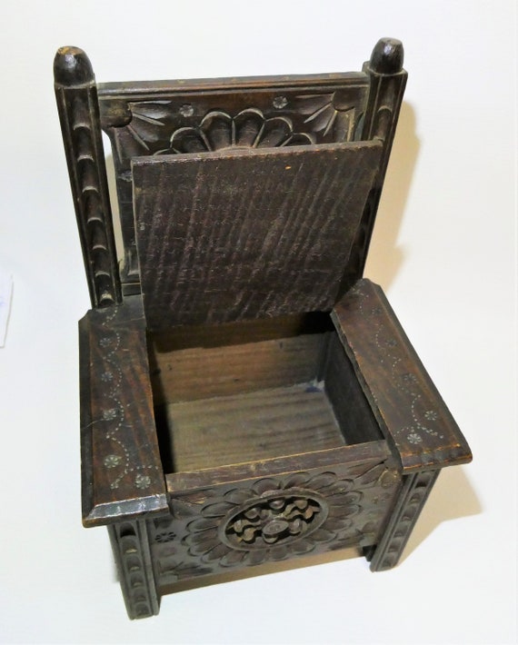 Old and beautiful chair (secret jewelry box) in carve… - Gem