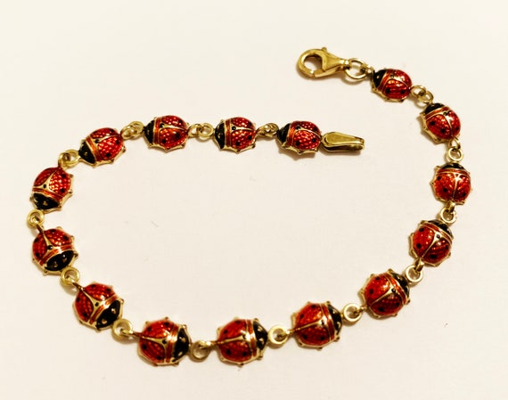 10k solid yellow gold(6mm thick) ladybug bracelet(7"i… - Gem
