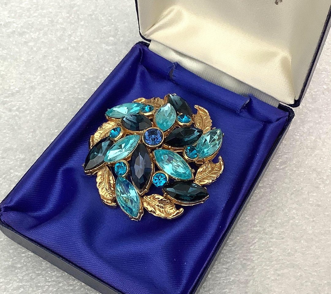 Vintage SPHINX Signed Pin Wheel Style Brooch With Blue Stones on ...