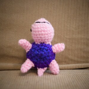 A Mini Multi Colored Turtle With a Light Pink Body/ A Mini Crocheted ...