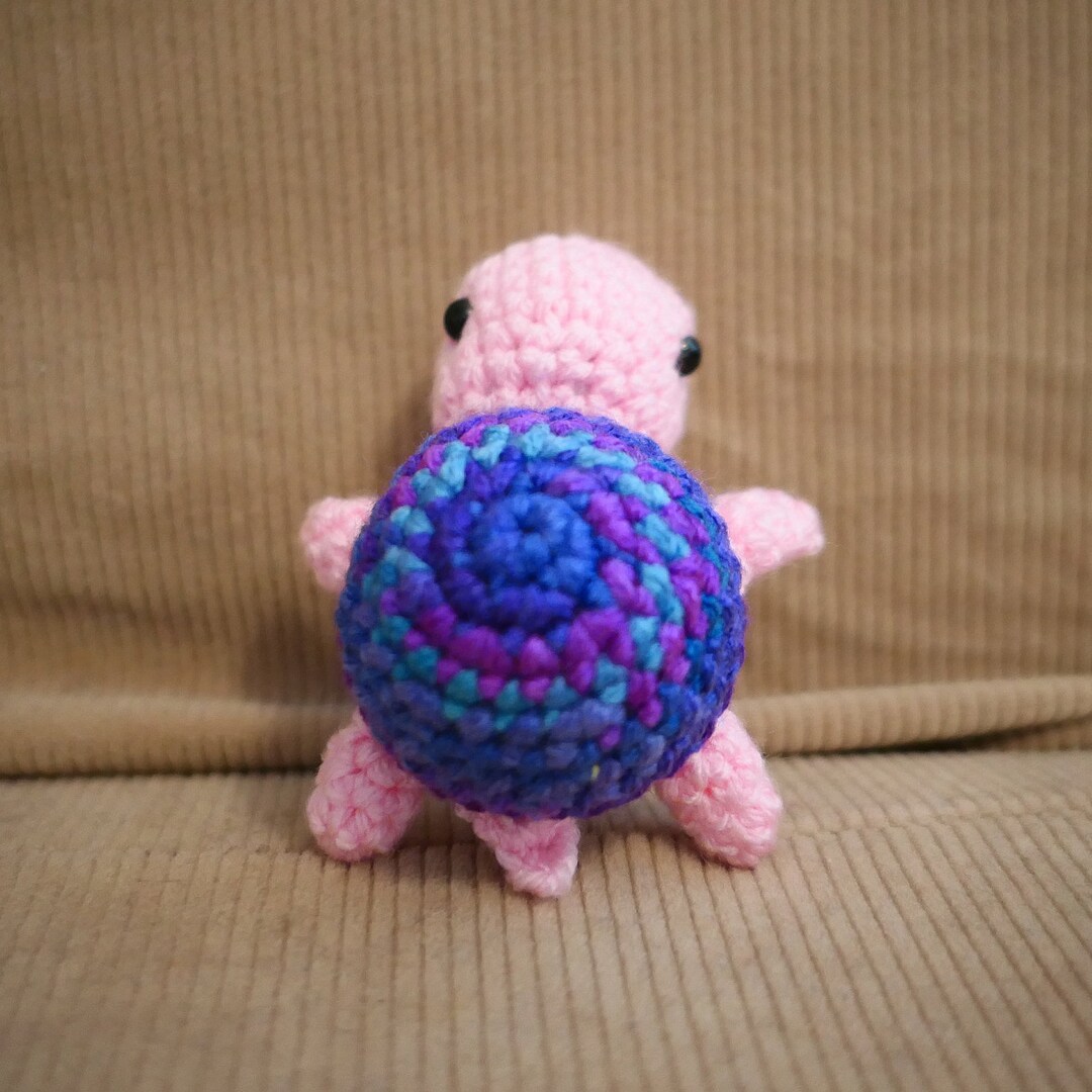 A Mini Multi Colored Turtle With a Light Pink Body/ A Mini Crocheted ...