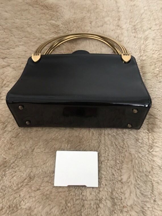 Super gorgeous gold metal handle black handbag - Gem