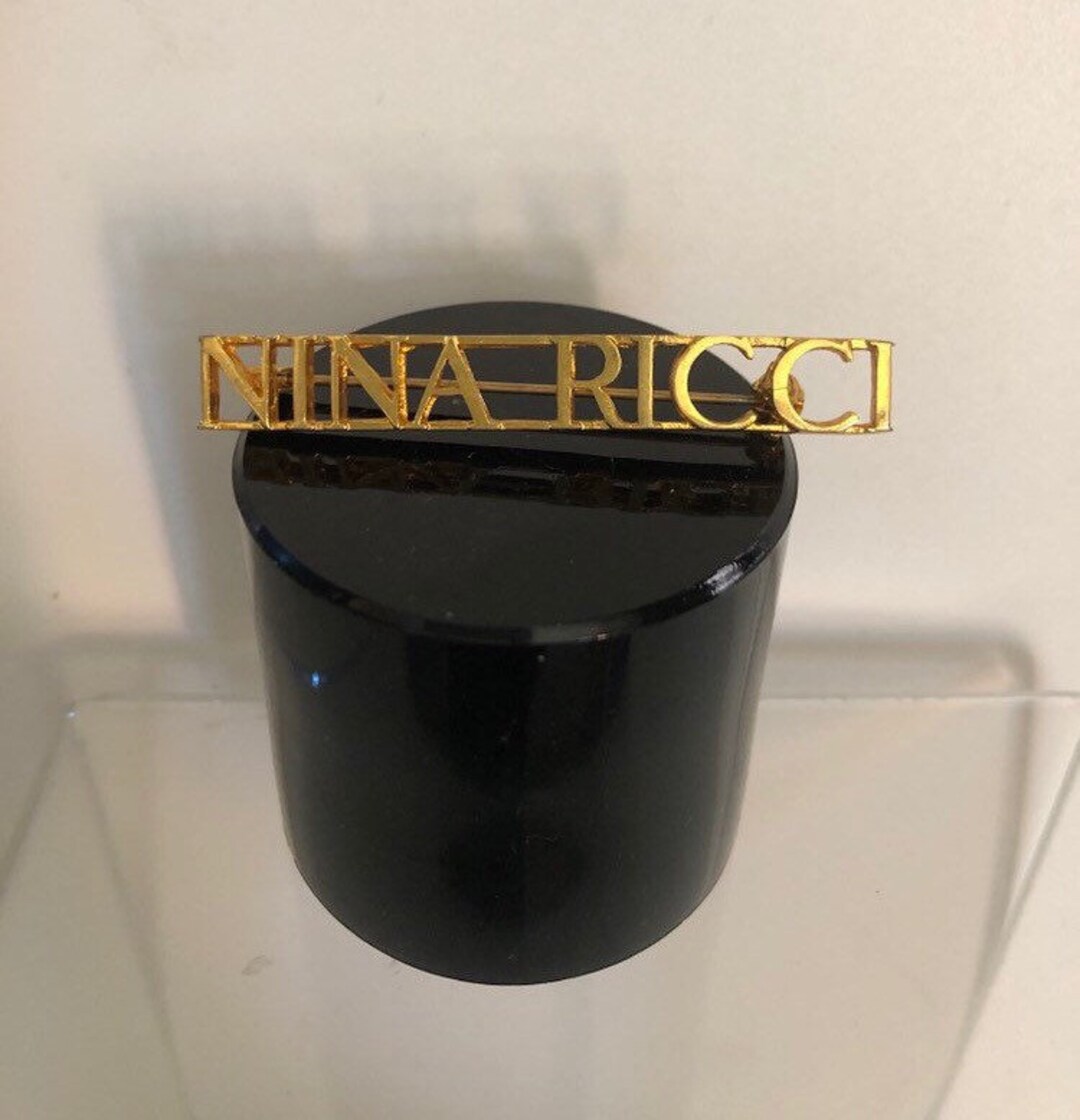Nina Ricci Golden Vintage Brooch - Etsy