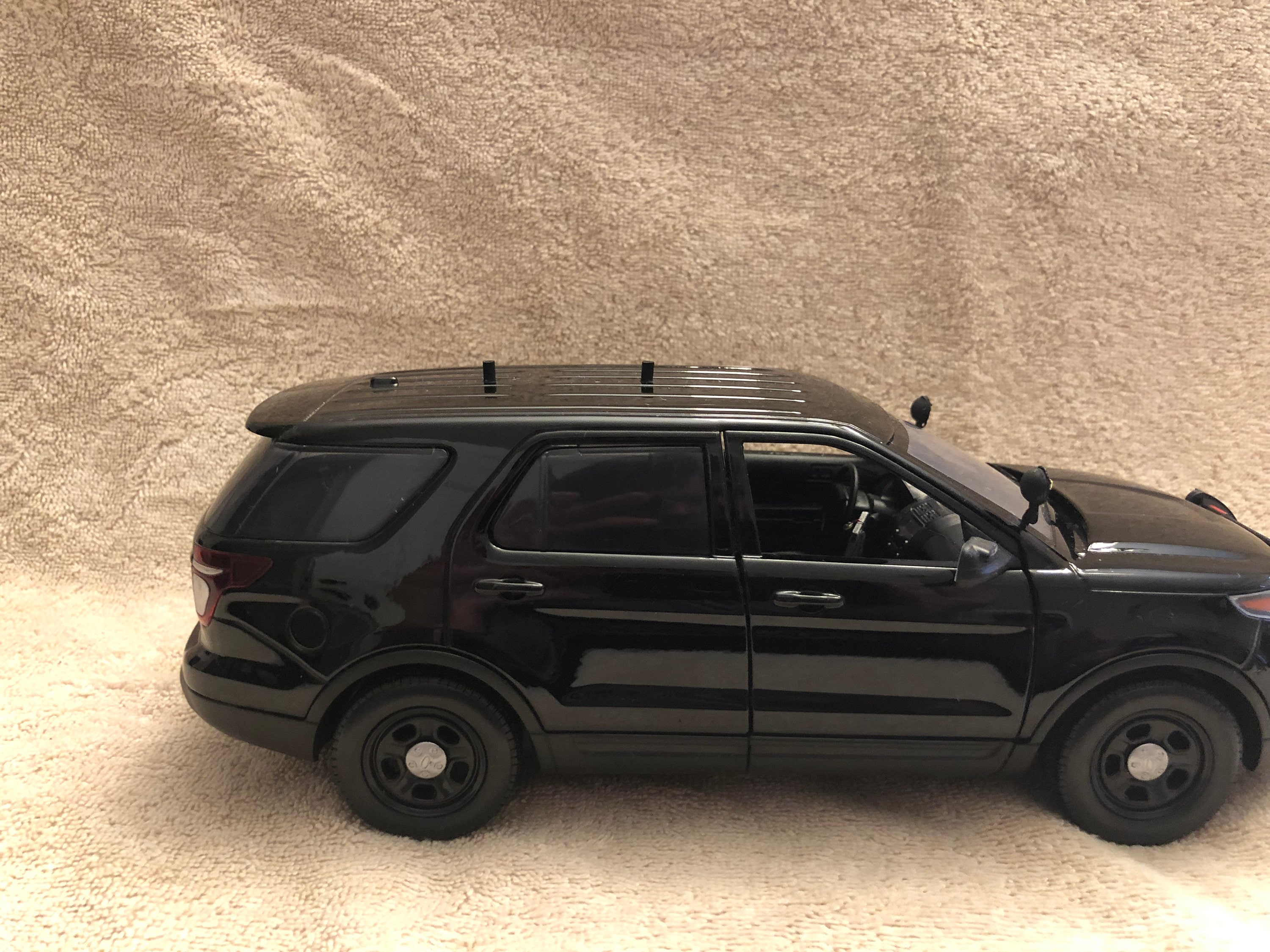 Black Unmarked Police Car